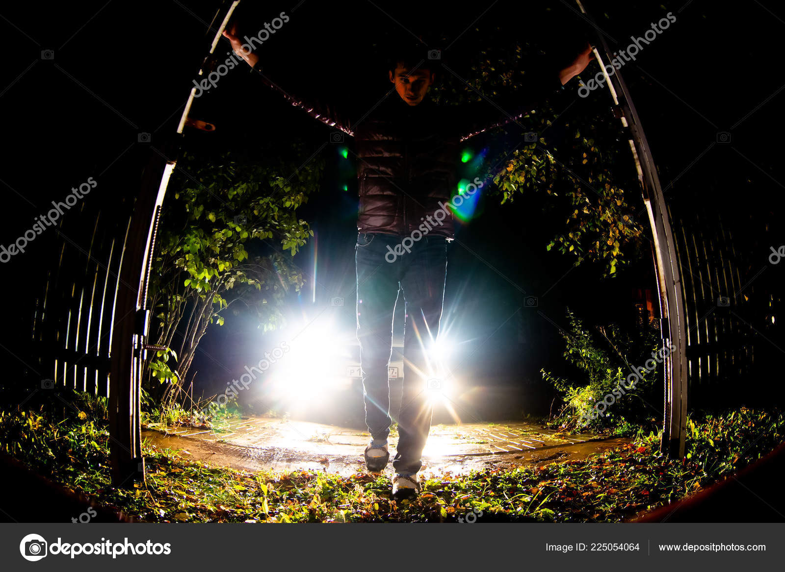 Young Man Opens Gate Drive Out Car Stock Photo by ©Parshko 225054064
