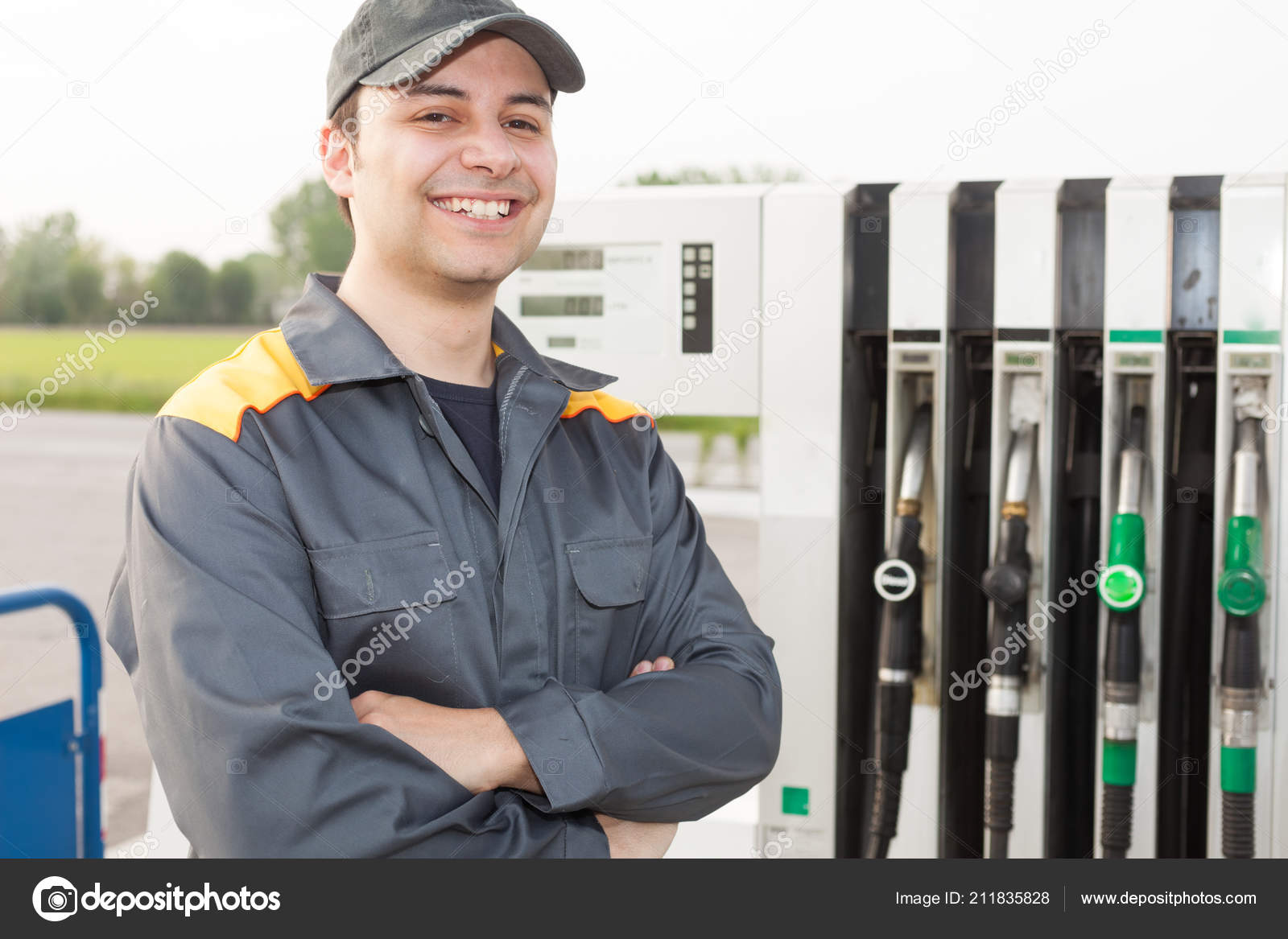 Smiling Worker Gas Station Stock Photo by ©minervastock 211835828