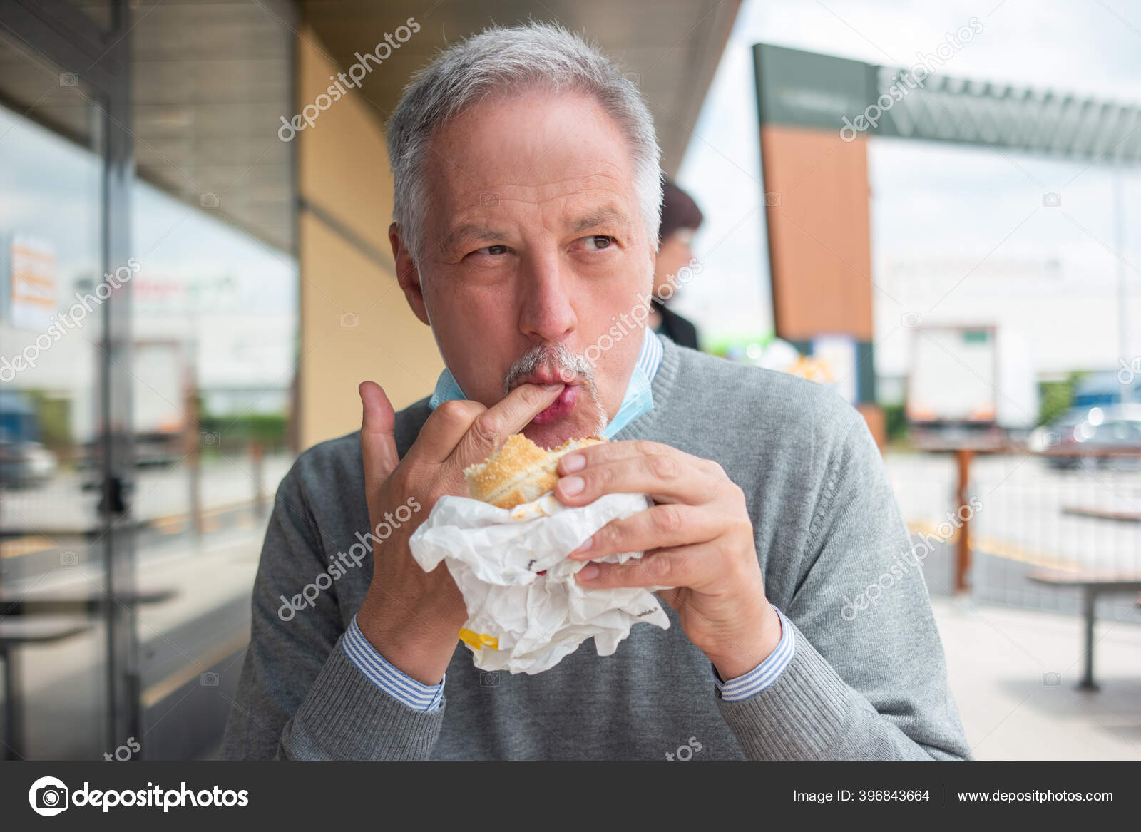 Man Eating His Fast Food Lunch Hamburger Mask His Chin Stock Photo by ...