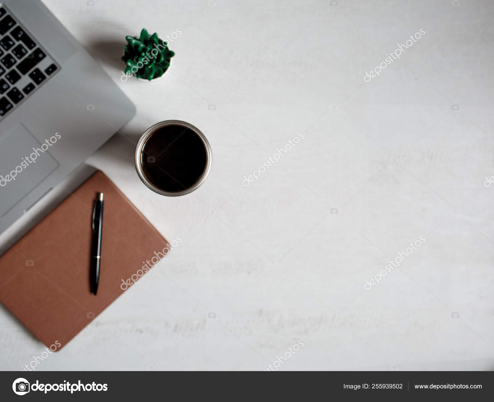 White office desk table with computer keyboard and other office ...