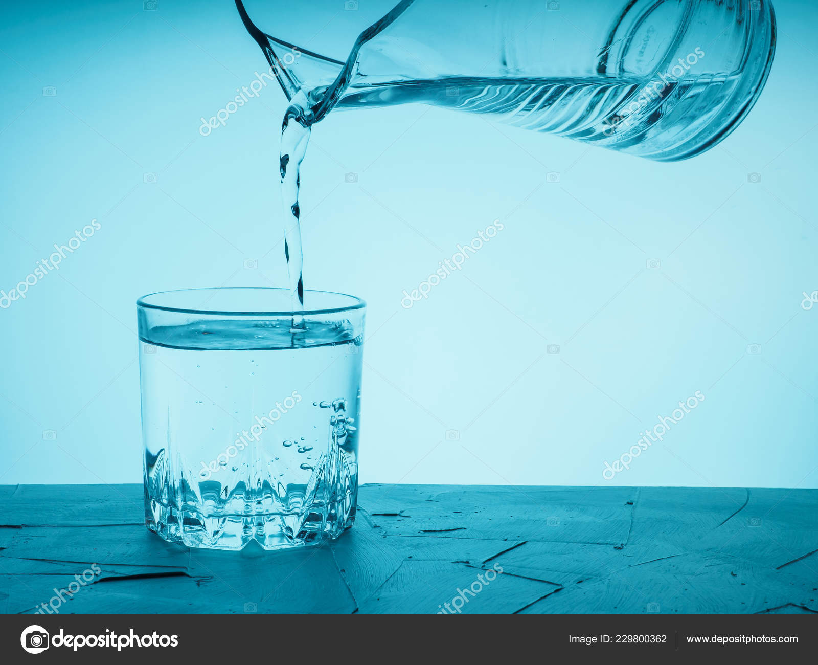 Pouring Pitcher Of Water