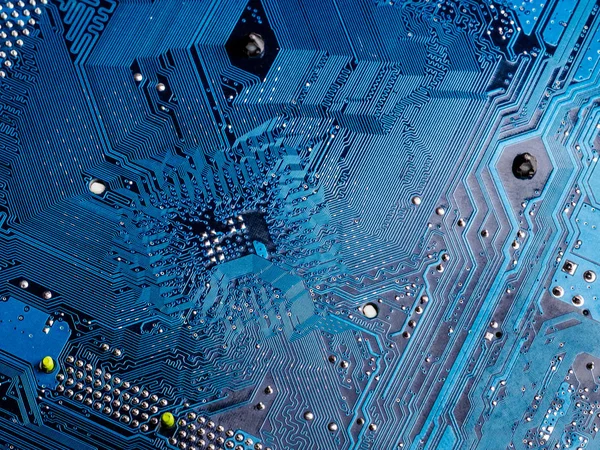 Blue computer circuit board Close-up. Electronic components of micro ...