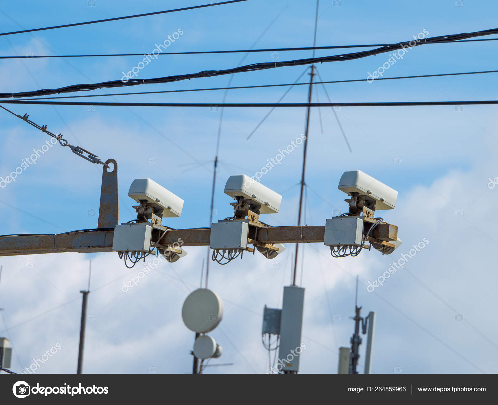 Modern speed control camera close-up on the background blue sky. Stock ...