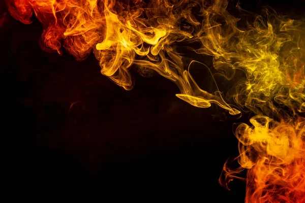Fire flames background. Colorful fiery smoke on a black isolated ...