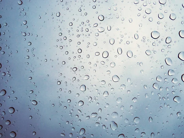 Beautiful rain drop on glass car. - Stock Image - Everypixel