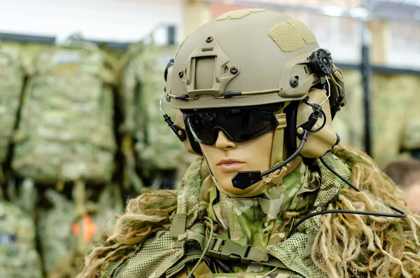 Mannequin in army helmet and camouflage gear. Weaponry — Stock Photo ...
