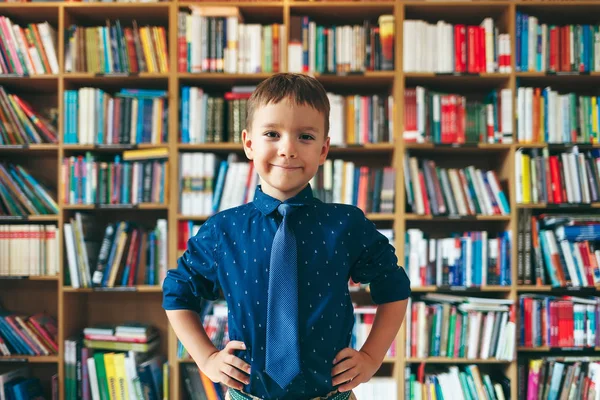 Boy in library Stock Photo by ©diignat 183182284