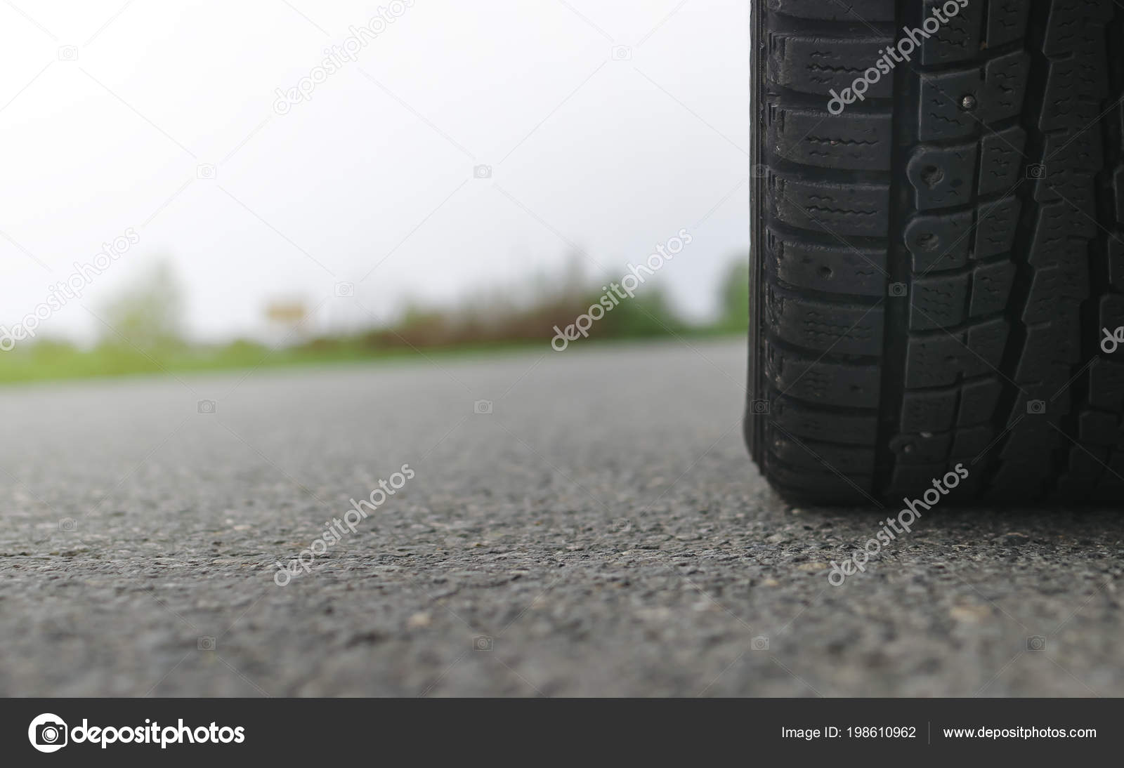 Car Tyre Close Empty Asphalt Road Cloudy Rainy Day Copy Stock Photo by ...
