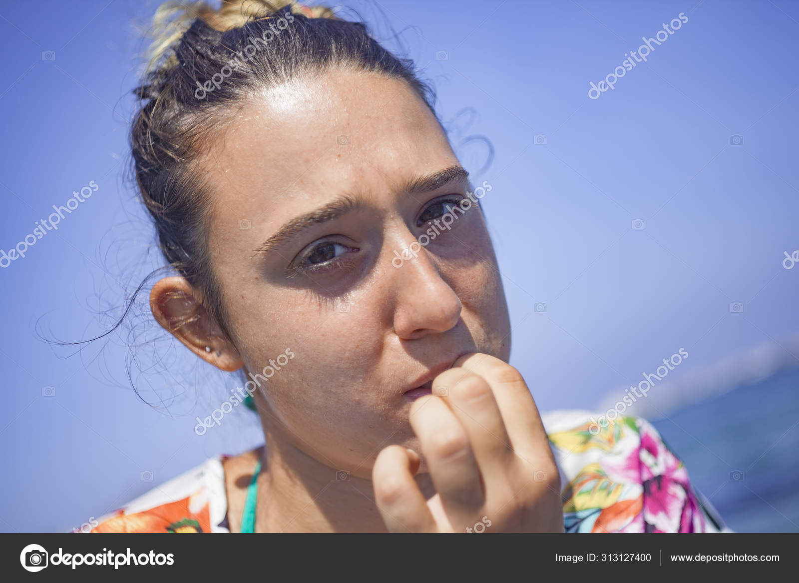 Girl eats her nails 2 Stock Photo by ©pippocarlot 313127400