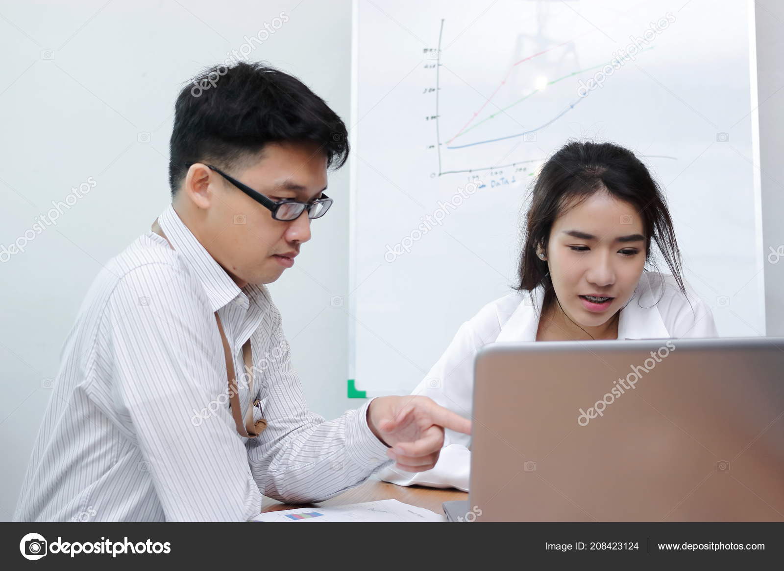 Two Young Asian People Brainstorming Together Modern Office Teamwork ...