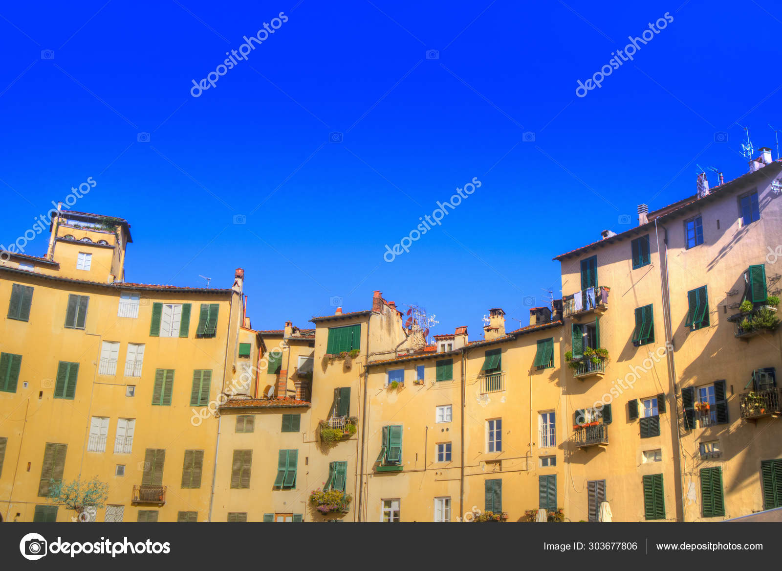 Piazza of the amphitheater of Lucca Stock Photo by ©Fotografiche 303677806
