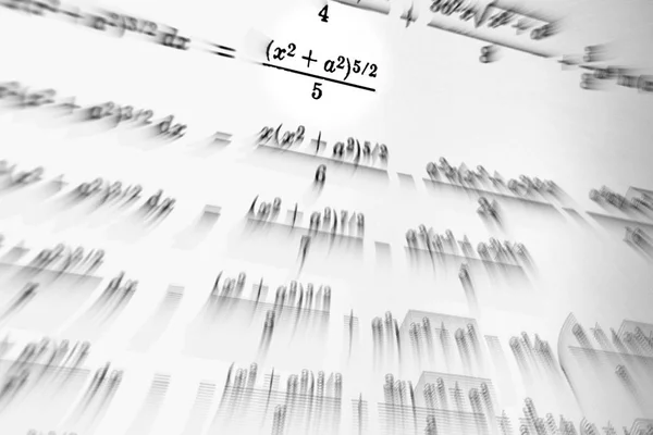 Large number of mathematical formulas focus zoom on a white background ...