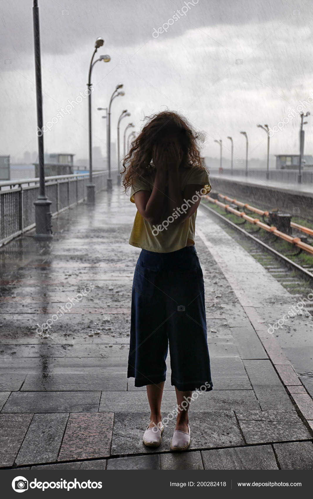 Sad Girl Walking In The Rain