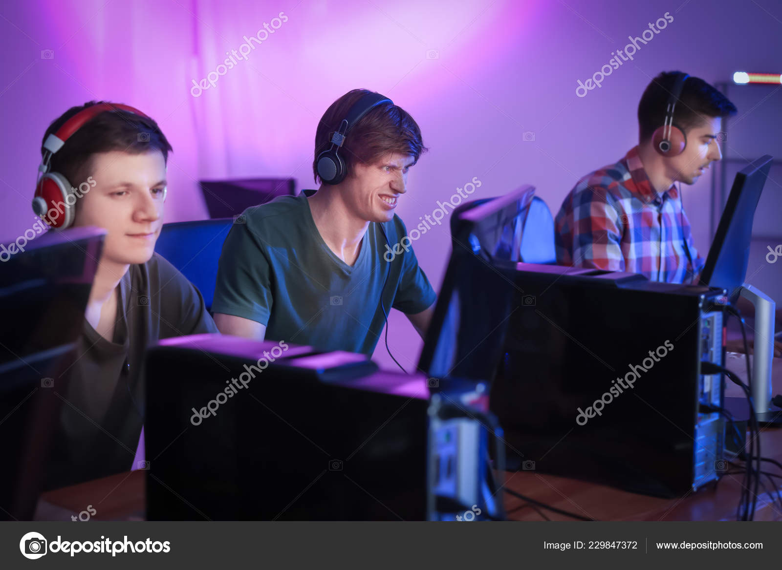 Young People Playing Video Games Tournament Stock Photo by ©belchonock ...