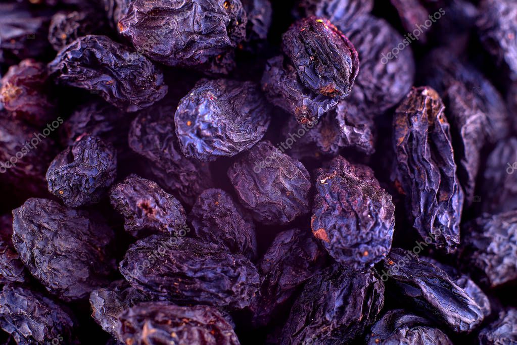 Textura de fondo de pasas negras, espacio para copiar. Textura de uva ...