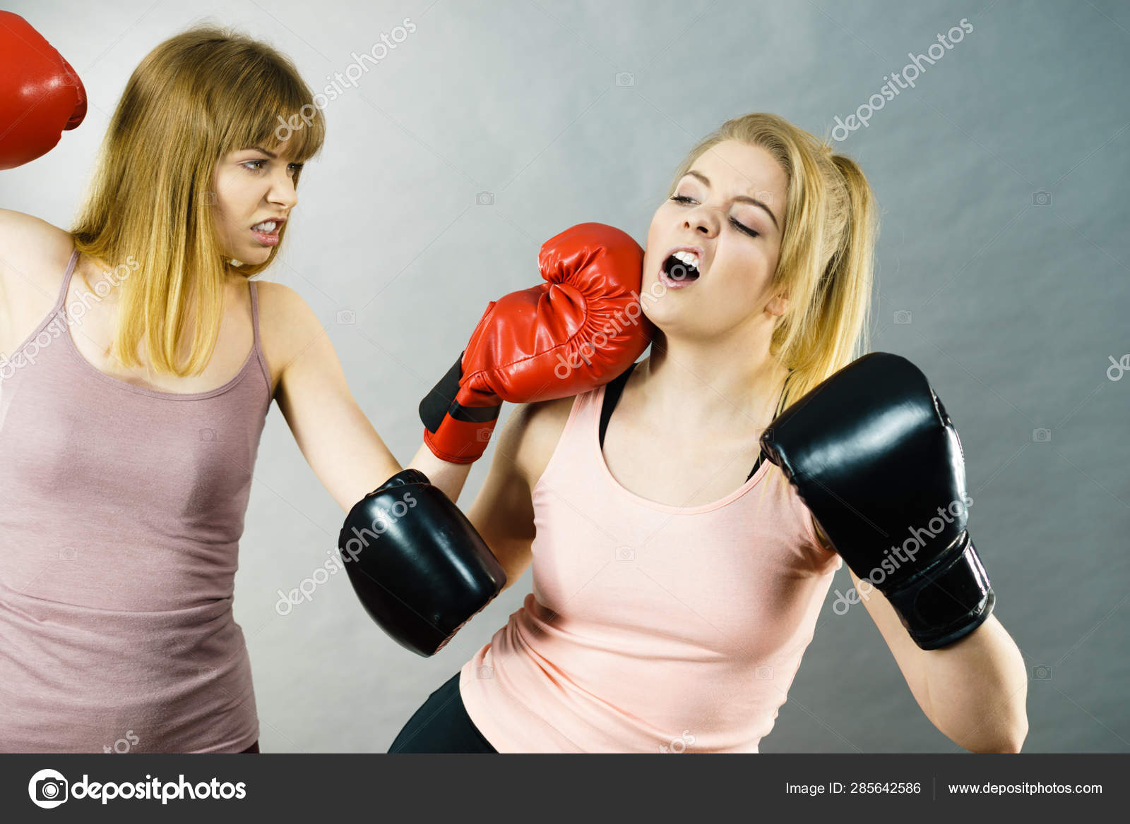Two agressive women having boxing fight — Stock Photo © Anetlanda ...