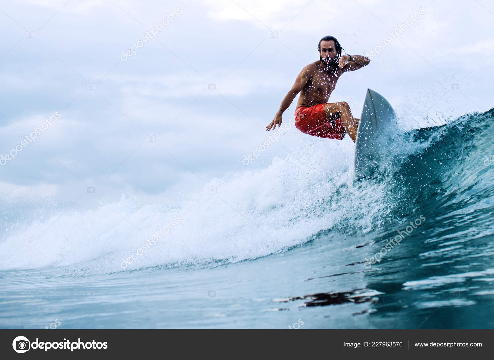 Surfer Riding Wave Graphic