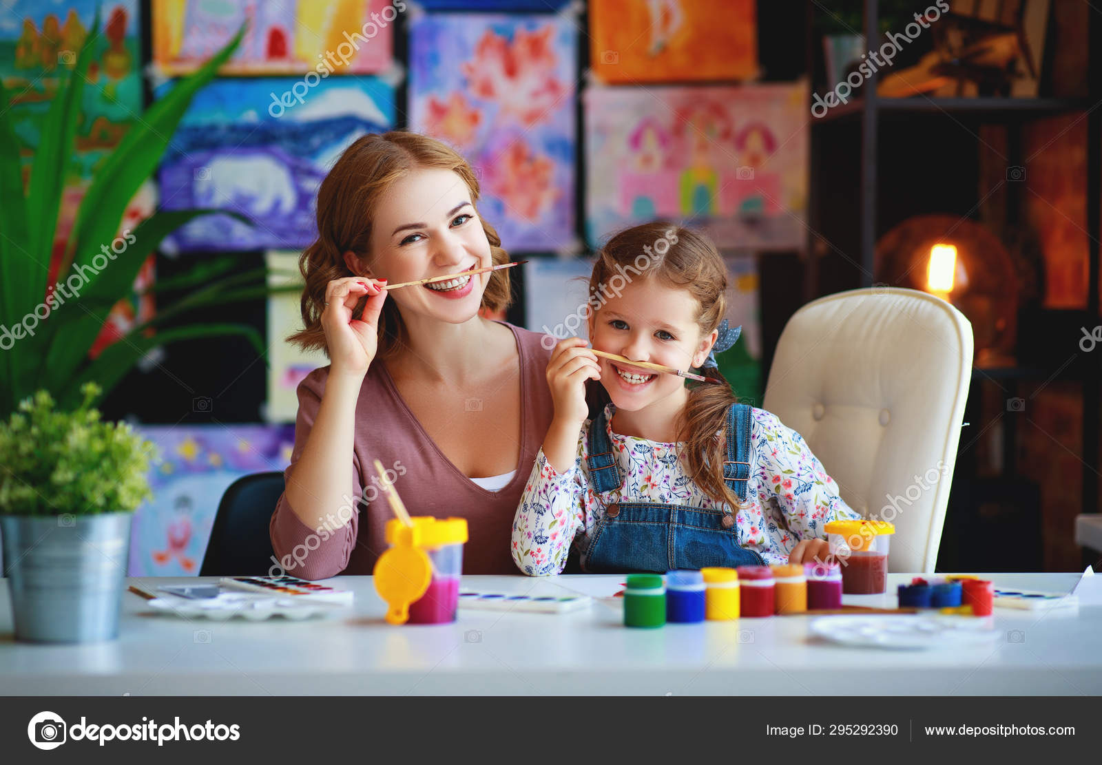 Mother and child daughter painting draws in creativity in kinder Stock ...