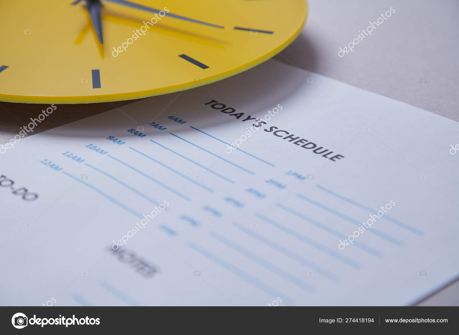 Time management deadline and schedule concept: yellow clock on the ...
