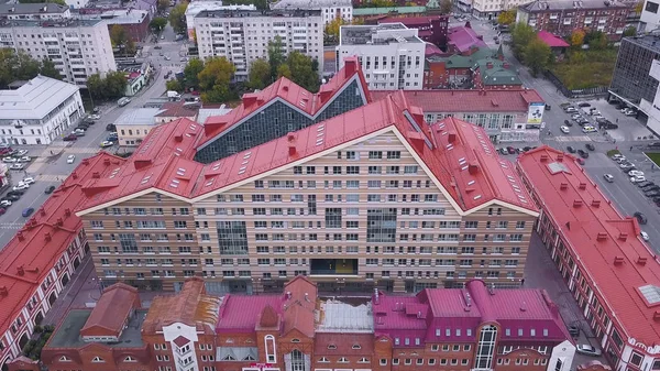 Top view of building with red roof. Clip. Complex of buildings in ...