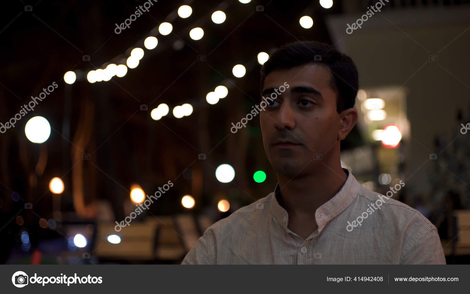 Sad single romantic man waiting for his girlfriend at the outdoor ...