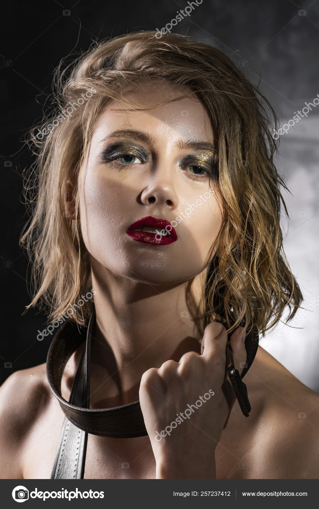 Conceptual Photo Of A Young Girl With Disheveled Wet Hair Naked