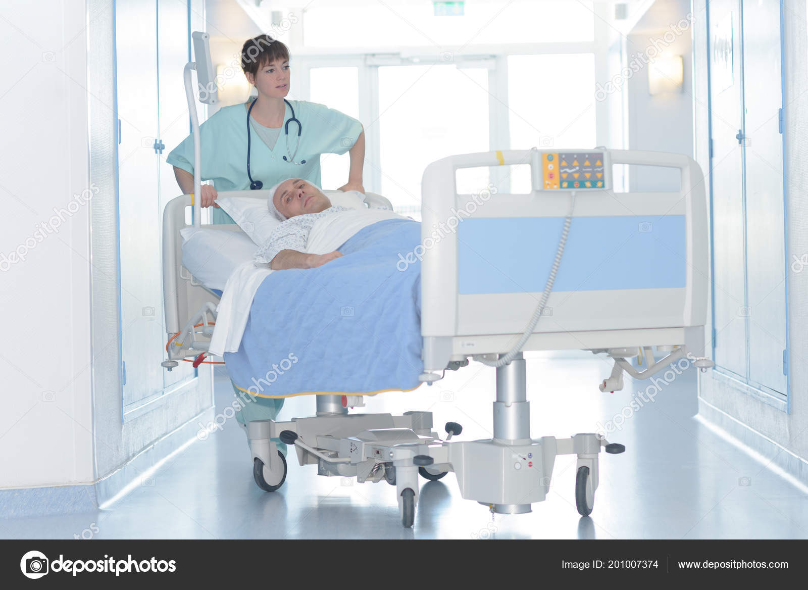 Nurse Pushing Patient His Bed Stock Photo by ©photography33 201007374
