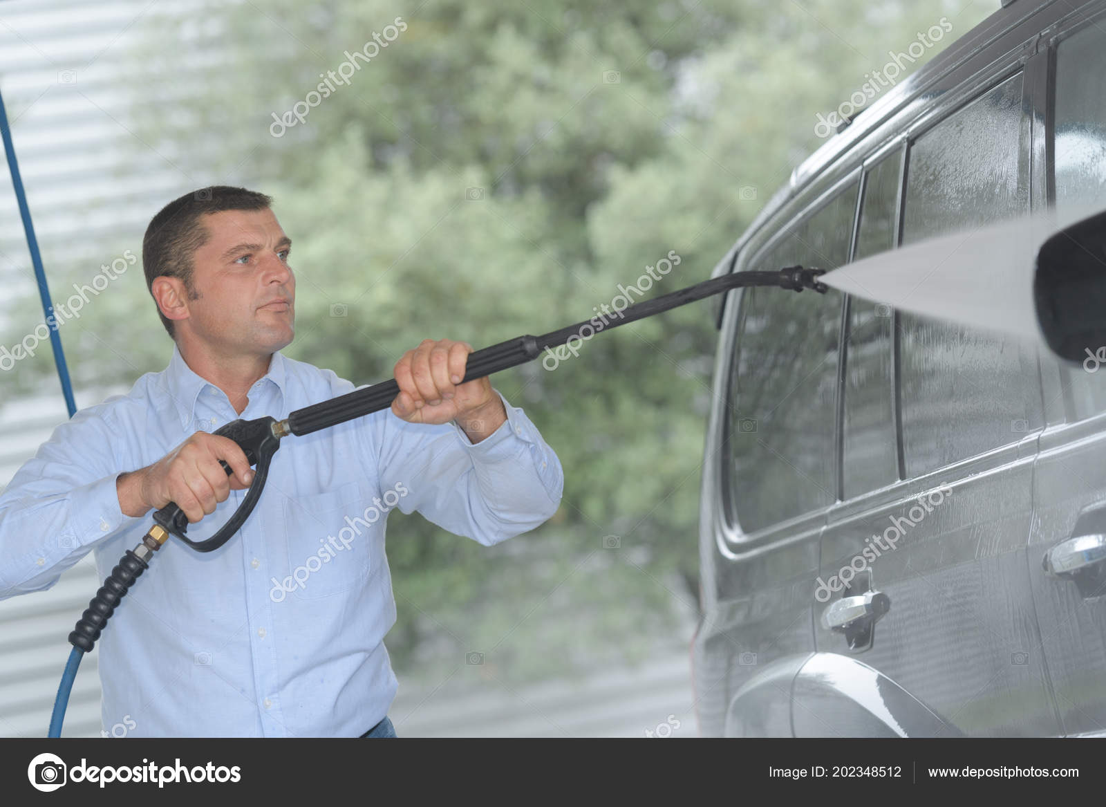 Handsome Man Cleaning His Car Outdoors Stock Photo by ©photography33 ...