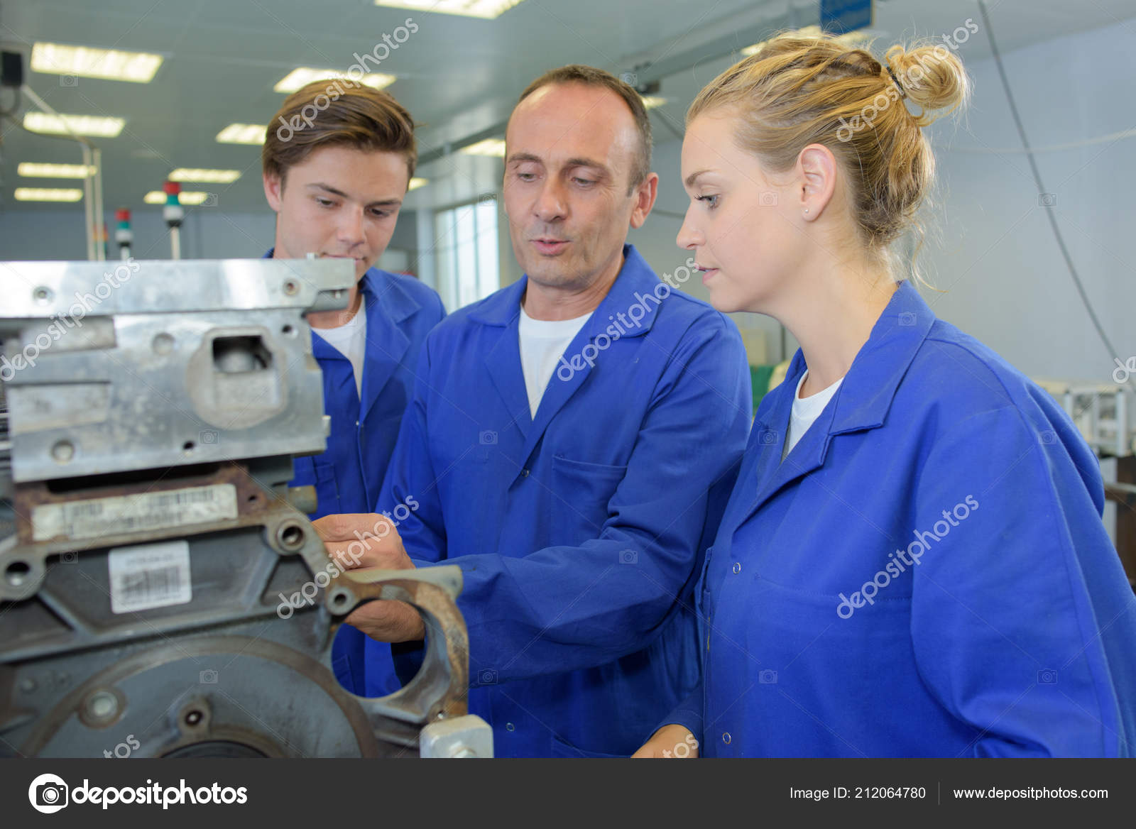 Tutor Laughingly Explaining Apprentices — Stock Photo © photography33 ...