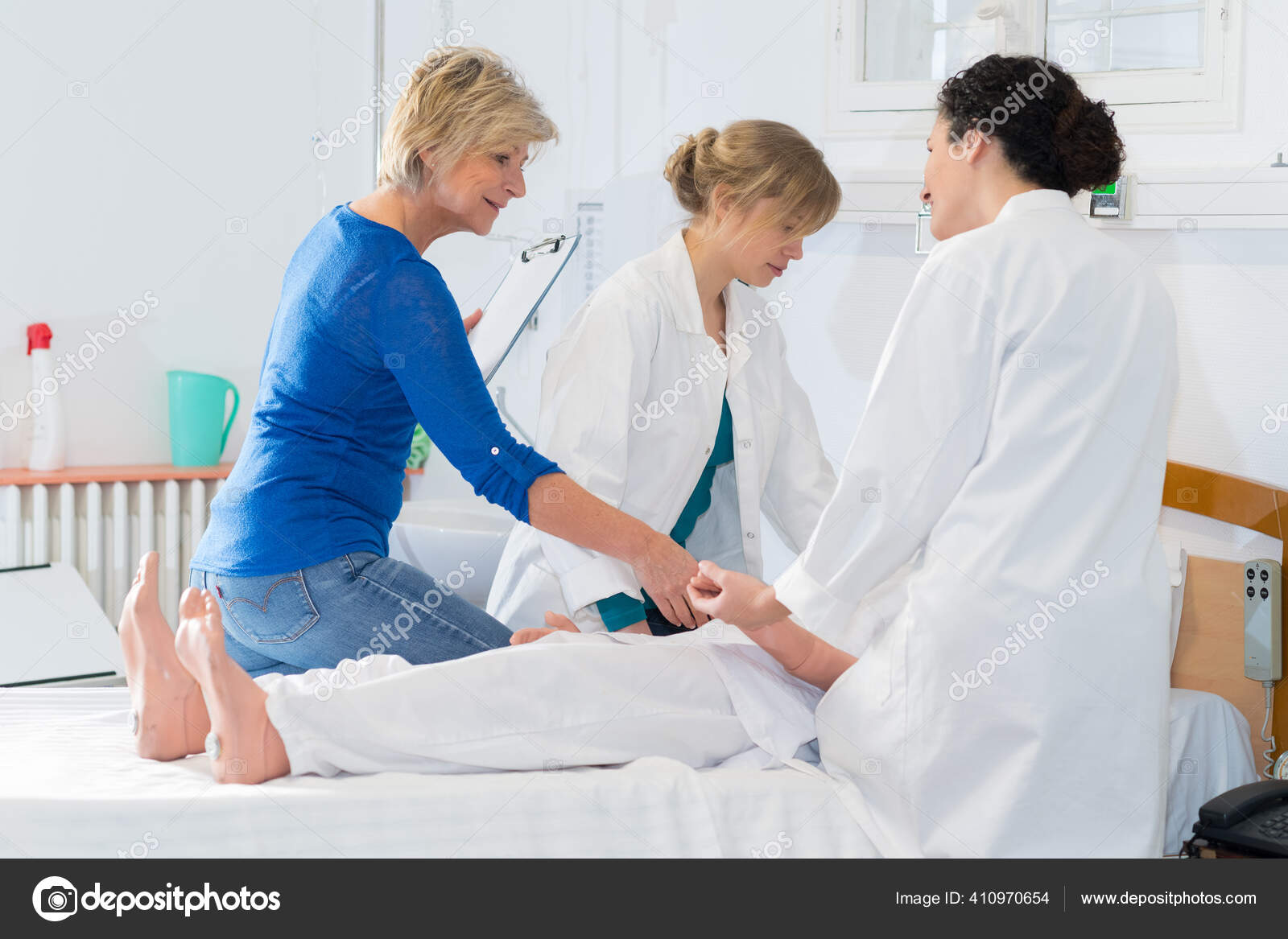 Trainee Nurse Sitting Patients Bed Hospital Stock Photo by ...