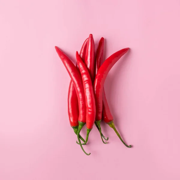 Creative layout of chili pepper on pink background. Minimal food ...