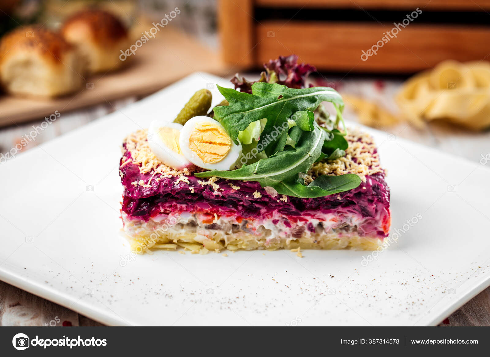 Russian dish Herring under a fur coat with greens — Stock Photo ...