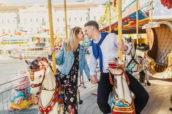 Carousel riding romantic couple on date Stock Photos, Royalty Free ...