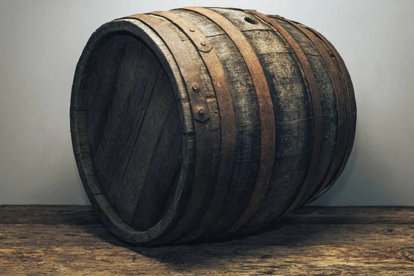 Beautiful wooden barrel on a old oak wood table white wall background ...