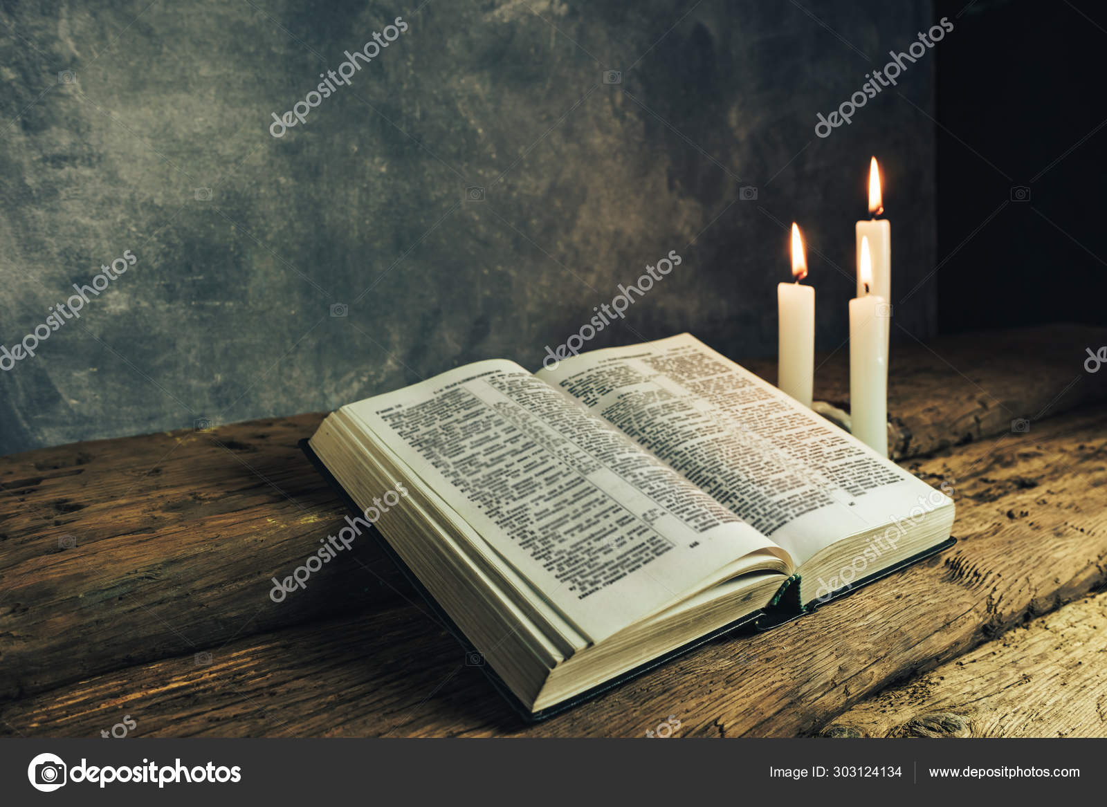 Open Bible With Candle