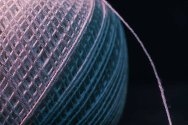 Close up beautiful tangle of thread in red and blue light background ...