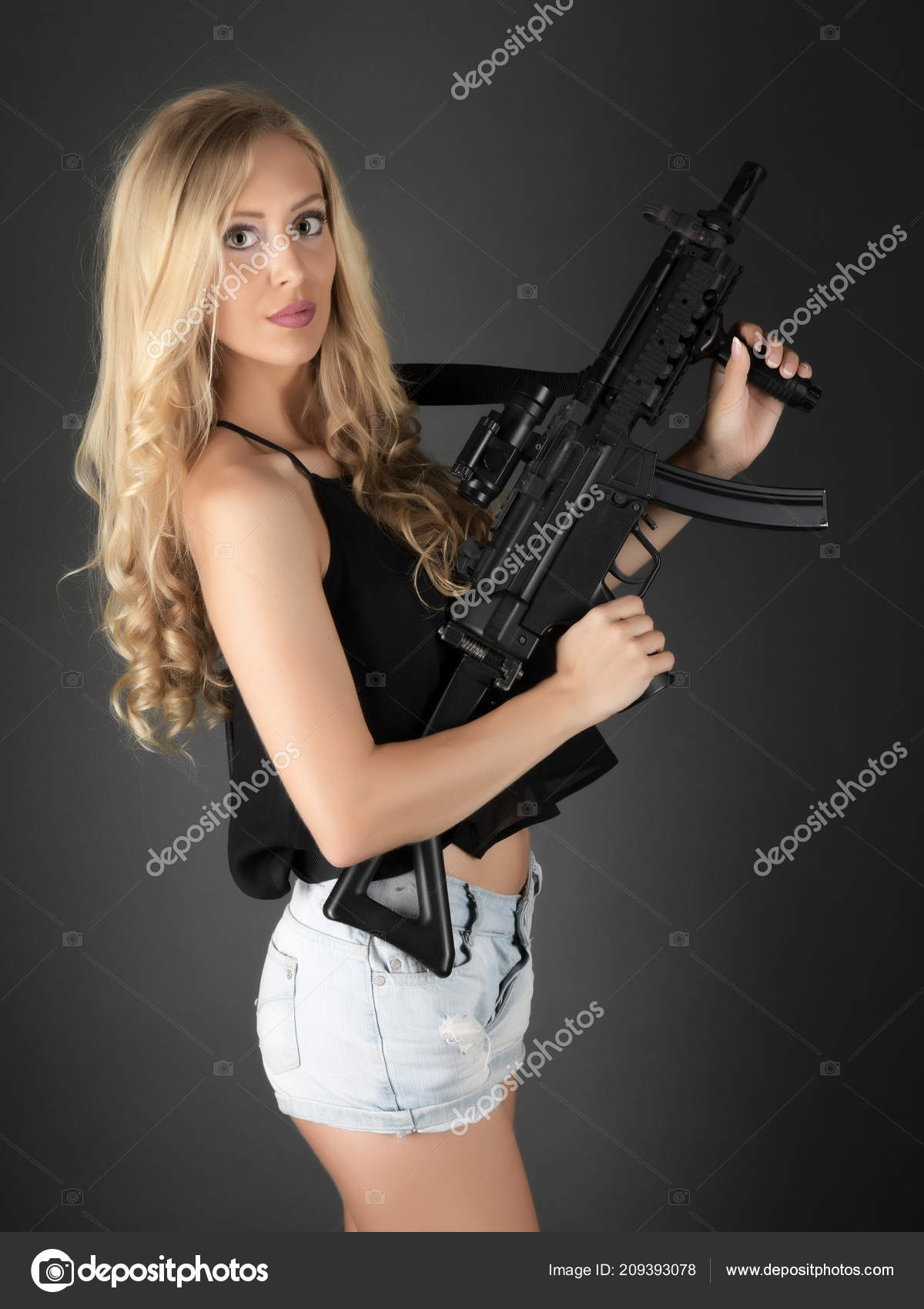 Female Assassin Gun — Stock Photo © muro #209393078