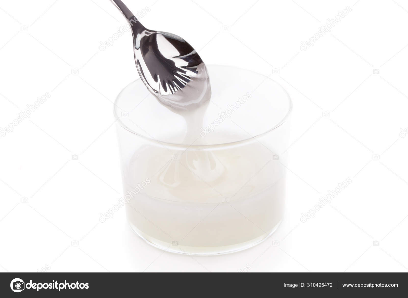 Inverted sugar syrup pouring from a spoon — Stock Photo © kateholms ...