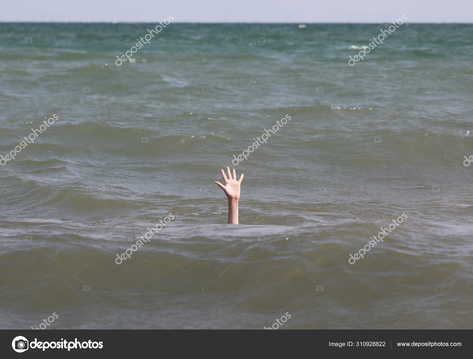 Hand of boy on the ocean — Stock Photo © ChiccoDodiFC #310928822