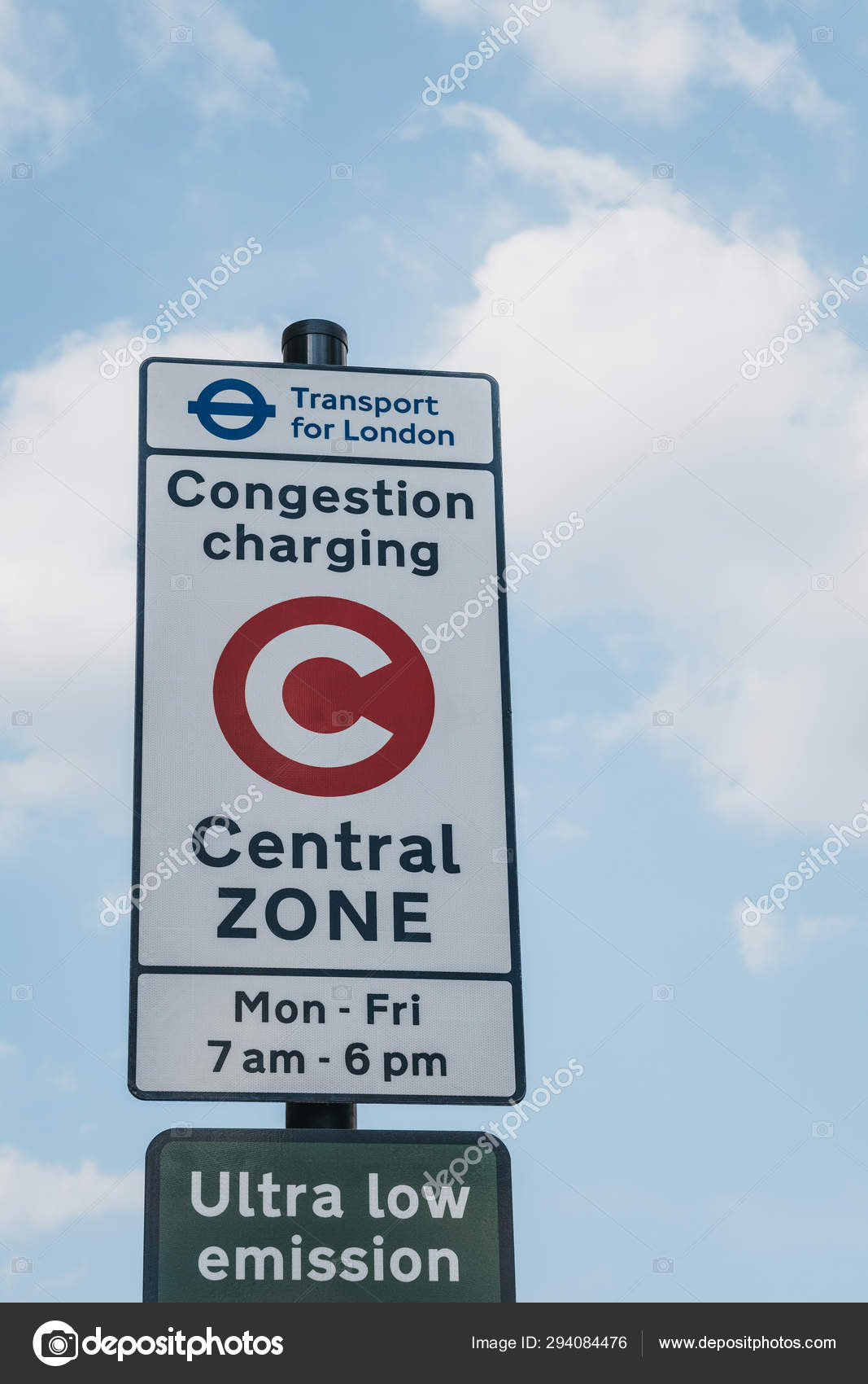 Congestion Charge Charging Central Zone sign against blue sky in ...