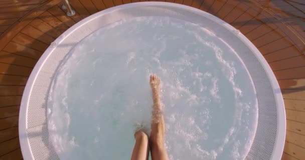 Female feet in the jacuzzi water, slowmotion. — Stock Video ...