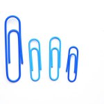 Two colored paper clips on white Stock Photo by ©Ragnarocks 2132262