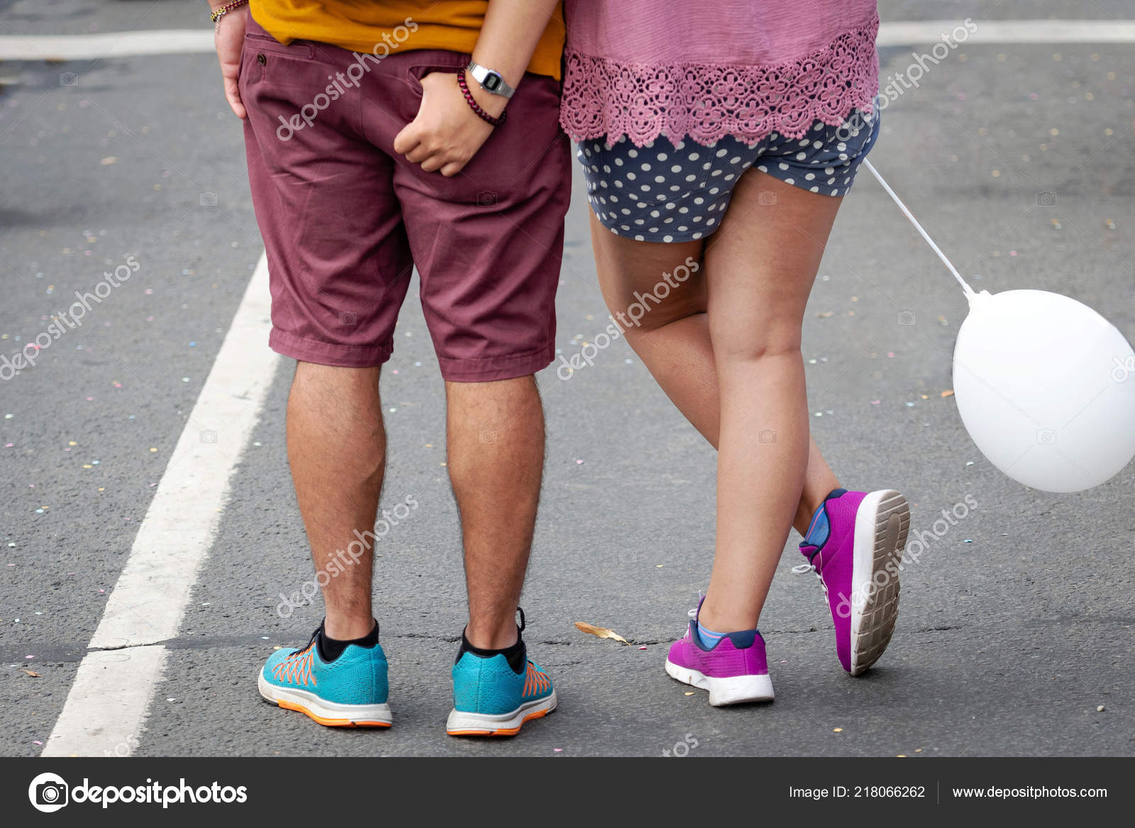 Contented Young People Balloon Hands Standing Street Only Legs Visible ...