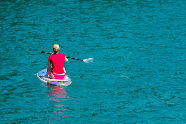 Woman paddle Stock Photos, Royalty Free Woman paddle Images | Depositphotos