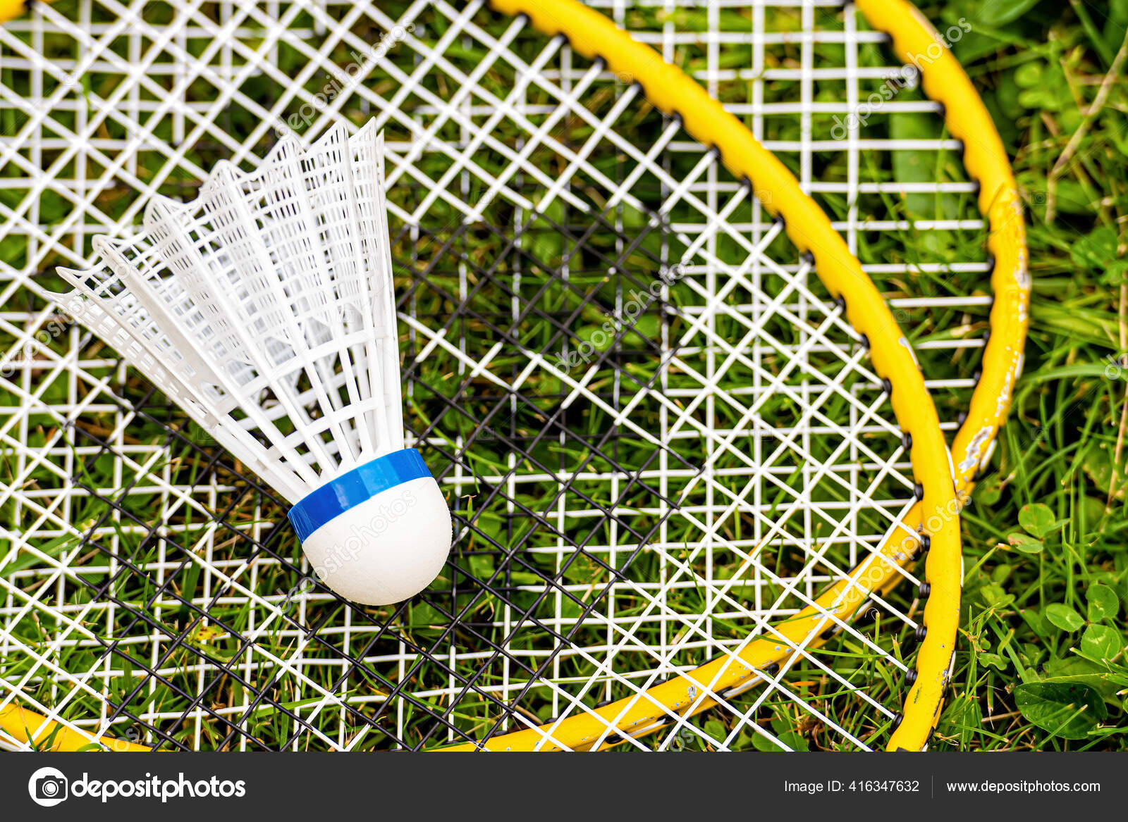 White Shuttlecock Close Yellow Badminton Rackets Green Grass Top View ...