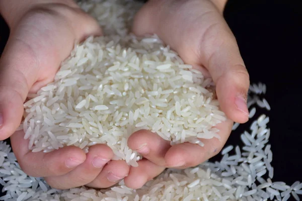 White Rice Hands Close — Stock Photo © GalinkaLB #248003360
