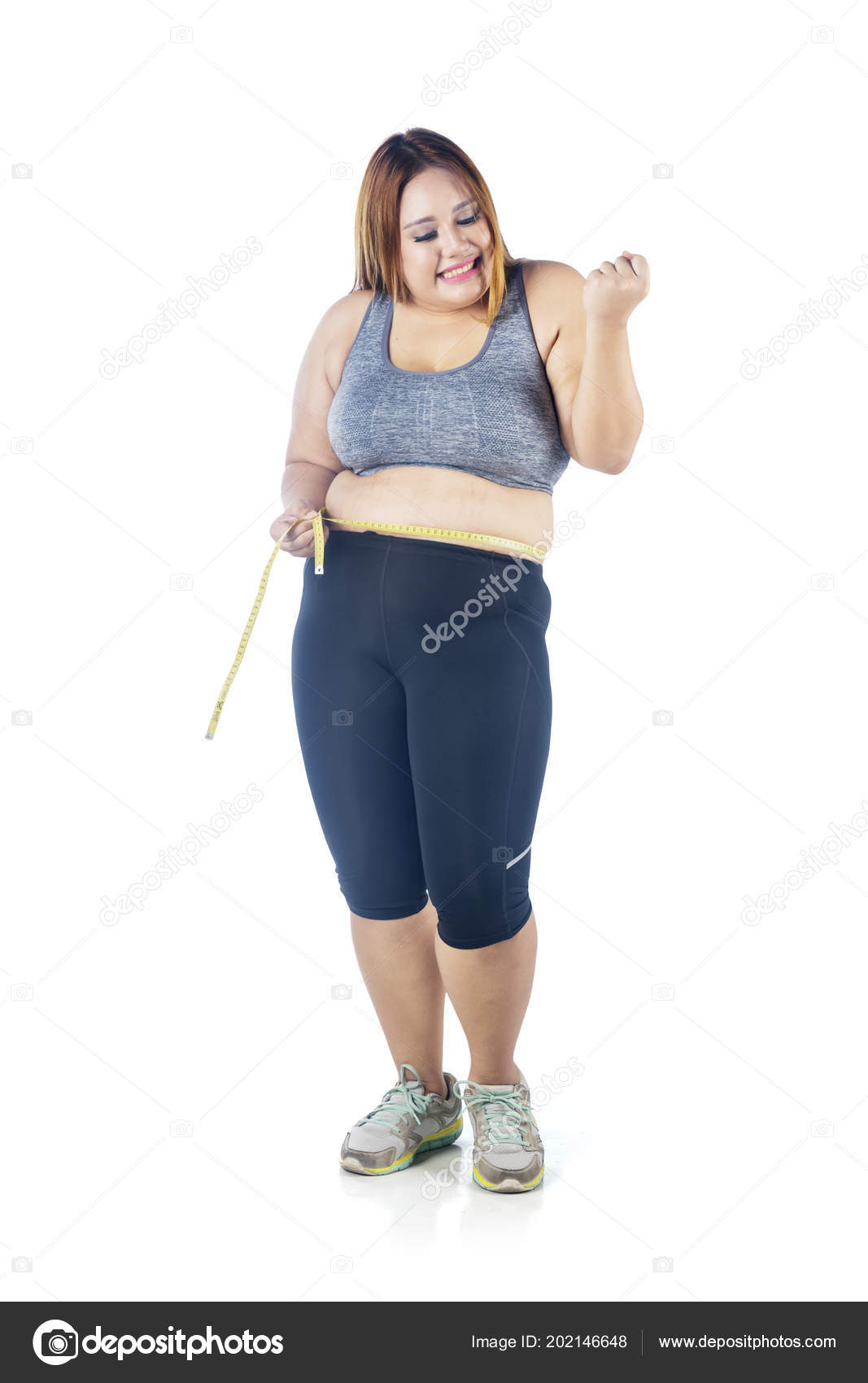 Full Length Obese Woman Expressing Her Success Weight Loss While ...