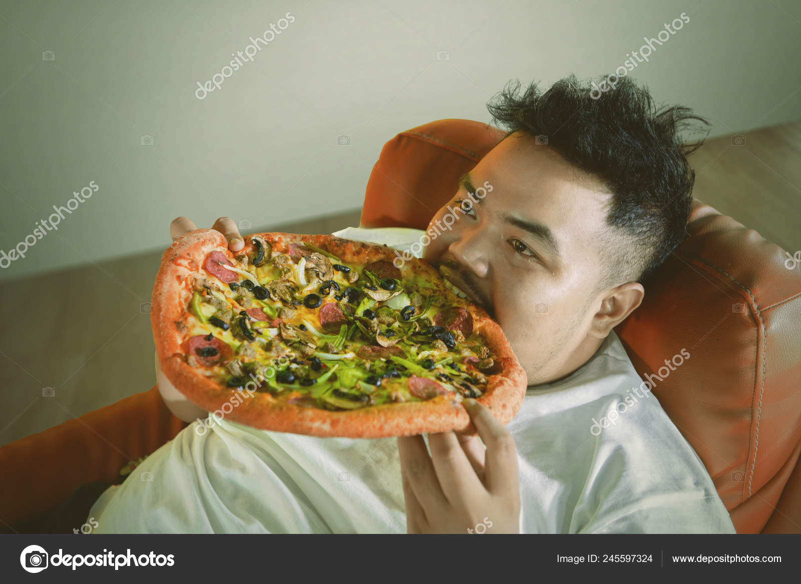 Close Happy Fat Man Eating Big Pizza While Sitting Sofa Stock Photo by ...