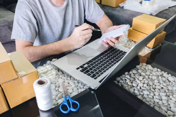 Small business parcel for shipment to client at home, Young entr ...