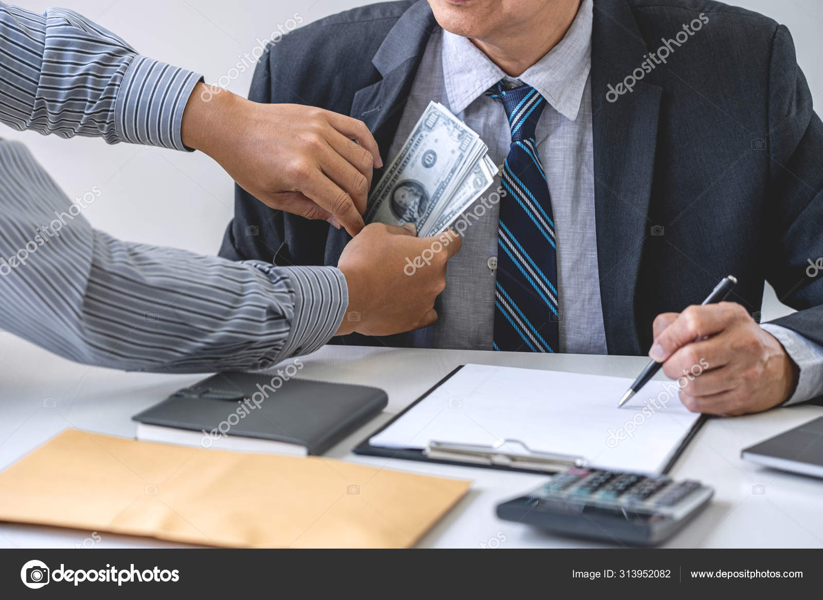 Bribery and corruption concept, bribe in the form of dollar bill Stock ...